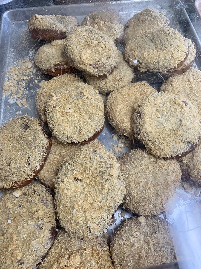 Maple walnut donuts wearing their crumb coats like fancy Sunday attire, ready for their close-up.