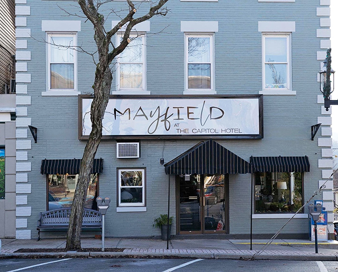 Mayfield at the Capitol Hotel proves that beautiful transformations don't require reality TV crews. This blue beauty balances historic charm with contemporary cool.