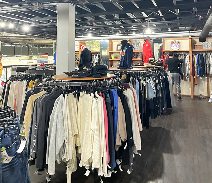 Racks of men's shirts tell stories of previous lives while awaiting their next chapter. Fashion reincarnation at its most affordable!