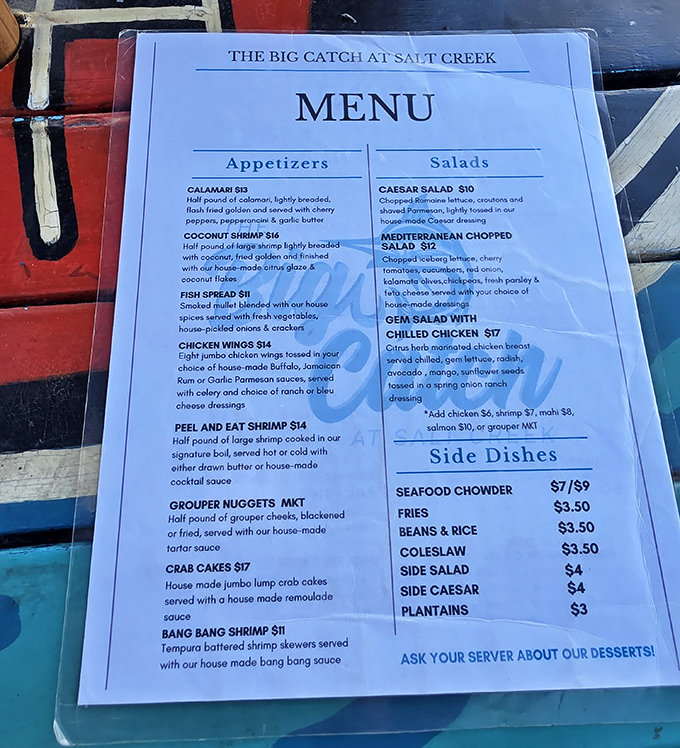 The menu reads like a love letter to the sea. Half a pound of calamari? That's not an appetizer, that's a commitment.