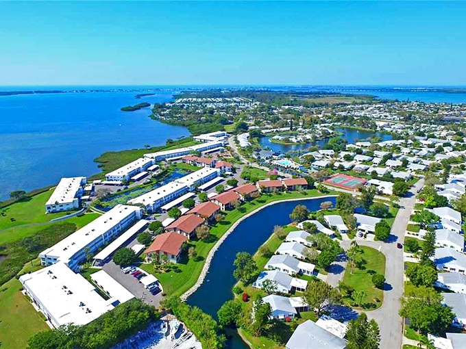 Waterfront communities like this one in Cortez offer residents the perfect blend of neighborhood living with nature's blue backdrop.