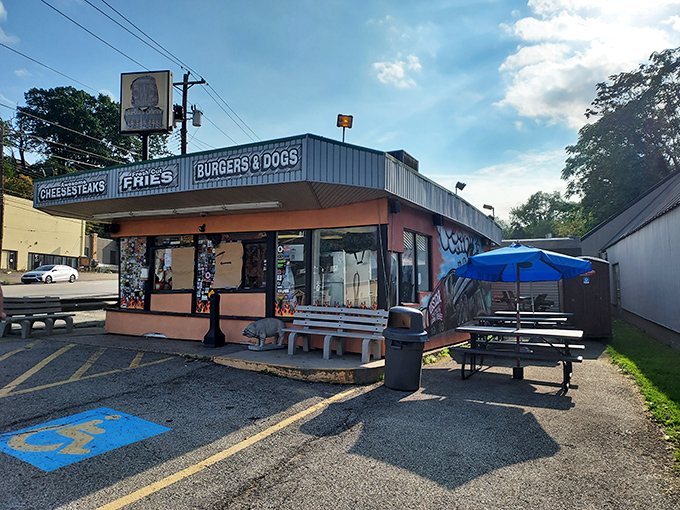 Blue skies and BBQ dreams &ndash; the simple outdoor setup at Rowdy BBQ proves great food doesn't need fancy surroundings, just picnic tables and patience.