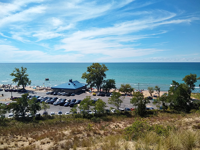 The beach from above reveals nature's perfect design &ndash; turquoise waters meeting golden sands under Michigan's impossibly blue summer skies.