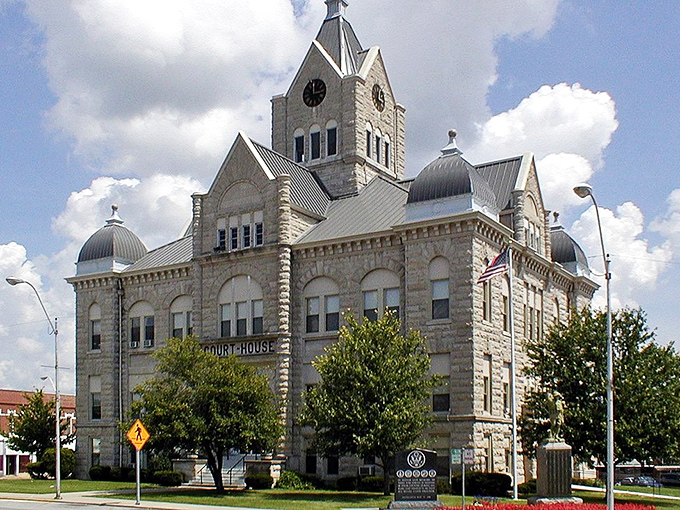 This stunning limestone courthouse commands respect like a Victorian grandmother - beautiful, dignified, and absolutely unmistakable.