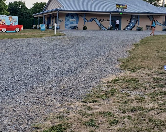That concession stand mural brings back memories of Saturday nights when gas was cheap and movies were simpler.