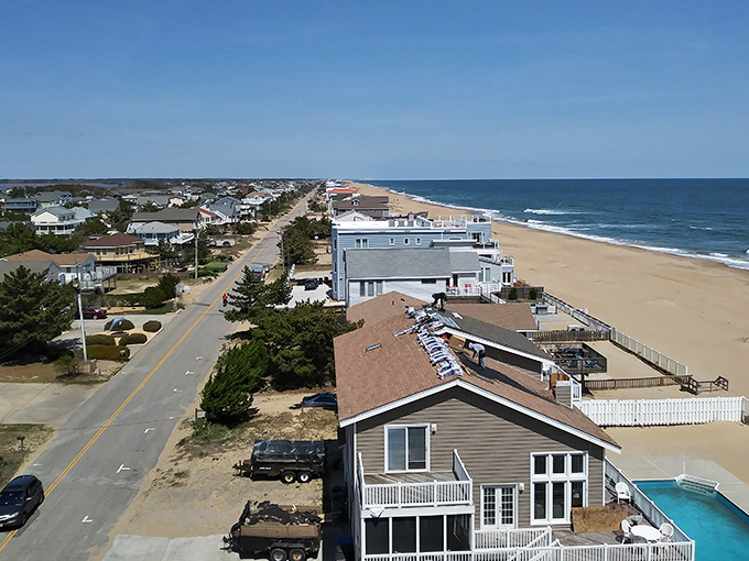 Beach houses perched at the edge of forever, where morning coffee comes with complimentary dolphin sightings and sunset cocktails are mandatory.