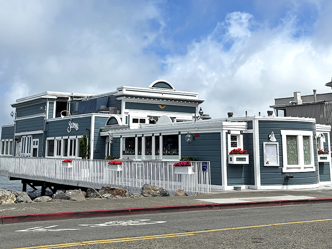 Scoma's of Sausalito stands sentinel at the water's edge, its blue-gray fa&ccedil;ade and white trim as classic as the seafood dishes served within.