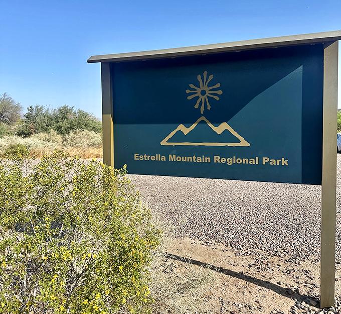 The gateway to adventure awaits! This unassuming sign marks the threshold between ordinary life and the extraordinary wilderness beyond.