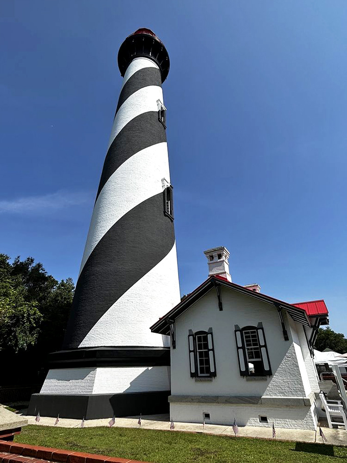Looking up at this 165-foot maritime giant makes you appreciate the engineering marvel that's weathered hurricanes and history while maintaining its distinctive barber-pole charm.