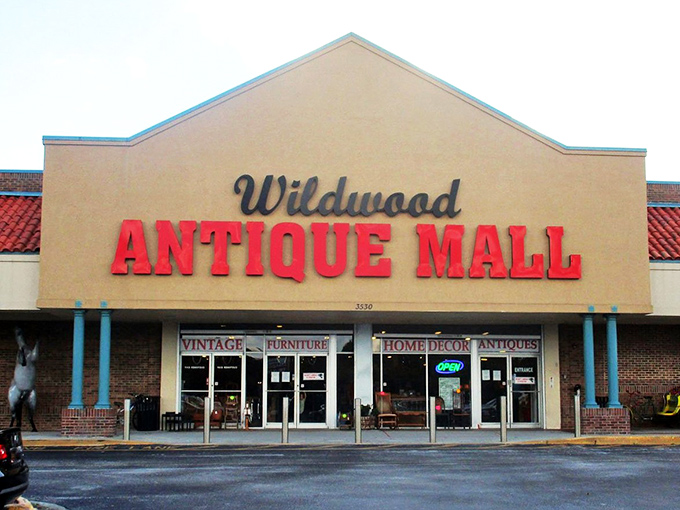 The unassuming exterior of Wildwood Antique Mall belies the wonderland of vintage treasures waiting inside. Like a time machine disguised as a strip mall.