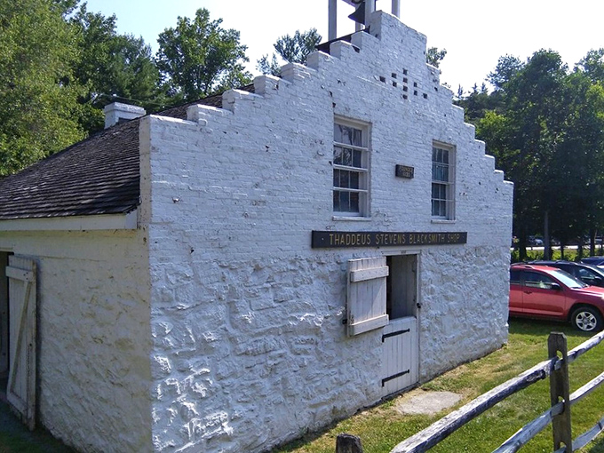 The Thaddeus Stevens Blacksmith Shop stands like a time machine made of stone and memories.