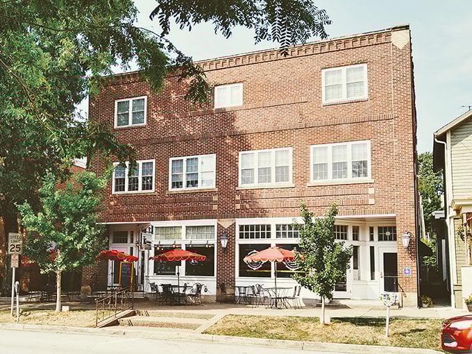 This brick building houses culinary treasures waiting to be discovered, with outdoor seating perfect for people-watching while savoring local flavors. 
