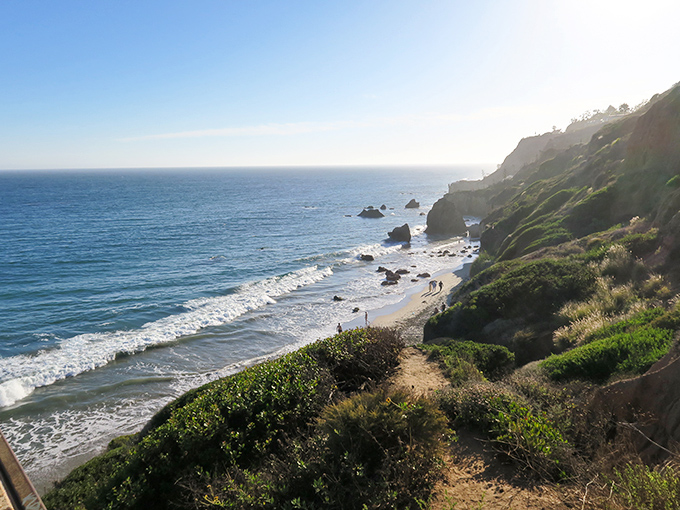 The view that launched a thousand Instagram posts. El Matador's pristine coastline stretches toward the horizon, promising adventure with every step down the bluff.