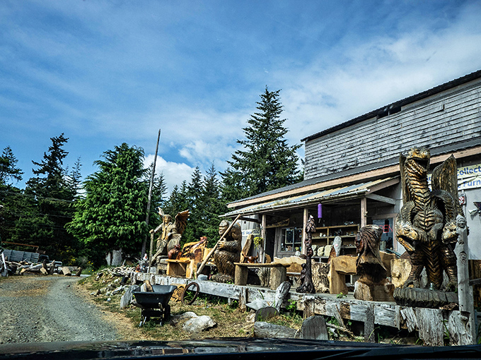 Wooden sentinels stand guard along the weathered building, like characters who wandered off a fantasy movie set and decided to stay.