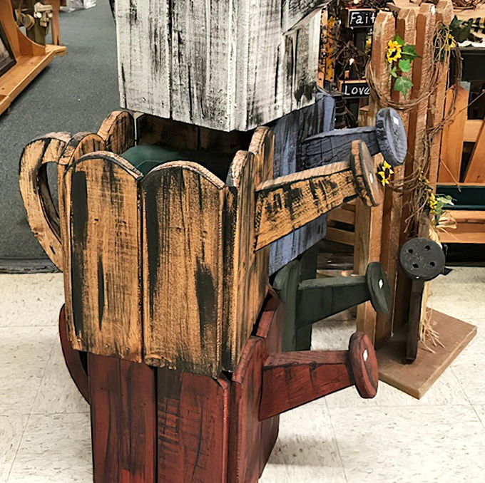 Rustic wooden watering cans prove that even functional items deserve artistic flair and countryside charm.