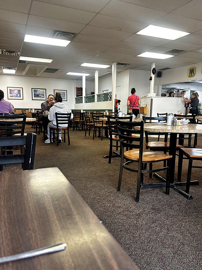 Inside Vic's, the simple wooden tables and practical chairs tell you everything: this place puts its energy into the food, not fancy decor.