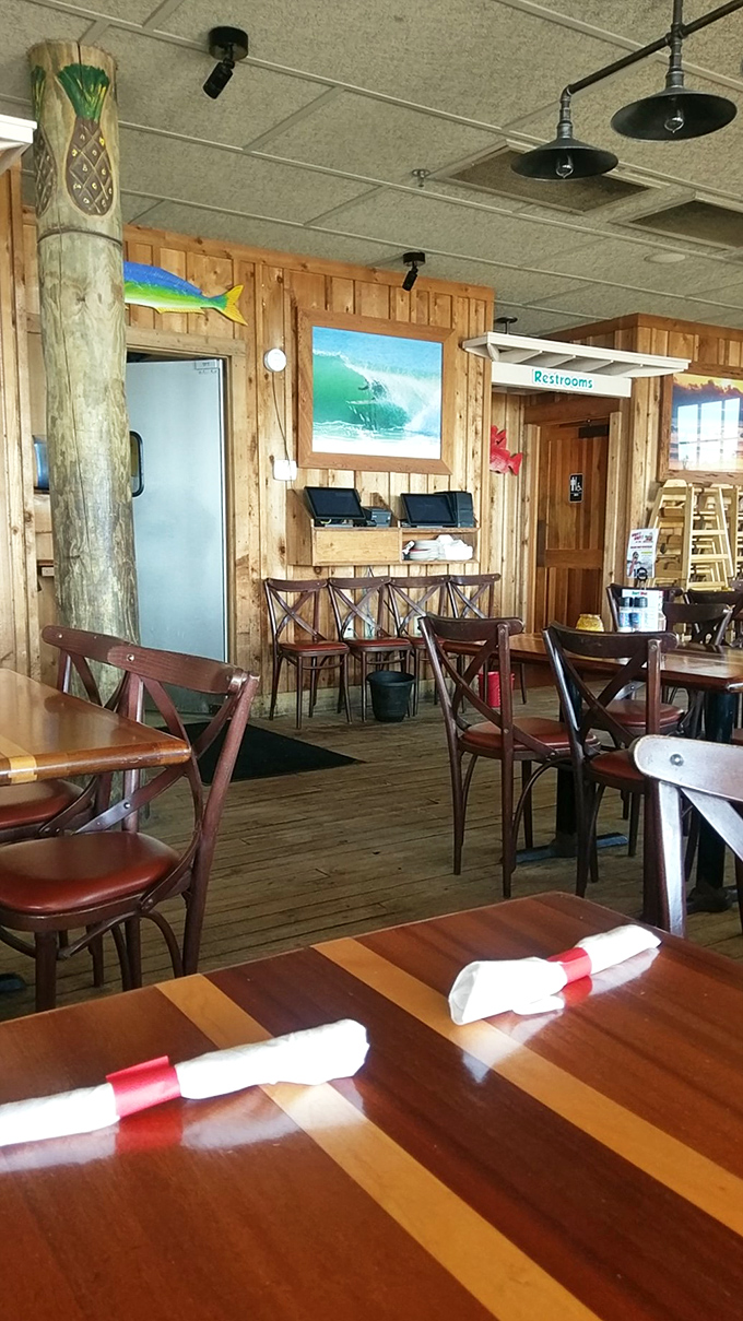 Wooden walls, surfboards, and nautical touches create that rare authentic beach atmosphere money can't manufacture. No interior decorator needed.