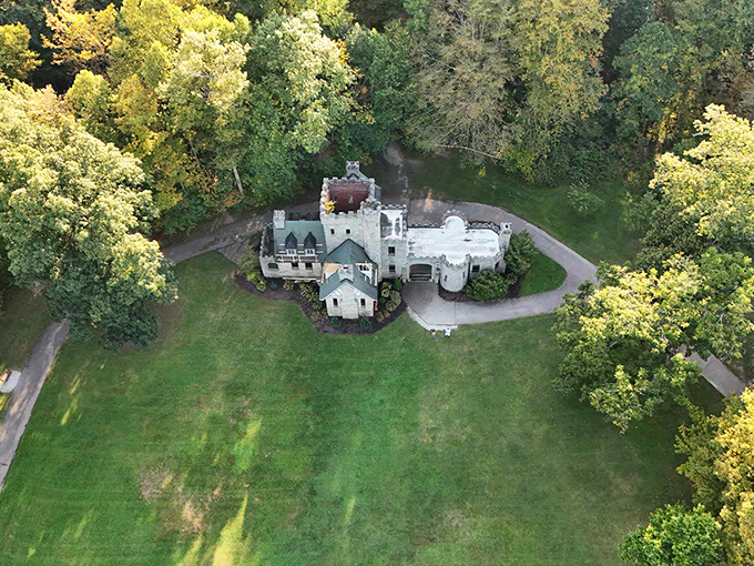 A bird's-eye view reveals Squire's Castle's perfect placement in its woodland setting, like nature's own royal garden surrounding this unexpected medieval treasure.