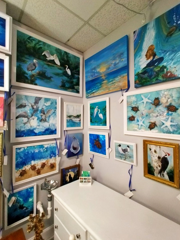 A gallery wall that would make any coastal art collector swoon. These ocean-inspired paintings transform a simple corner into a seaside escape.