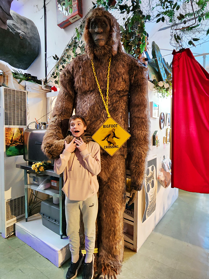 Nothing says "Pacific Northwest" quite like posing with a towering Bigfoot wearing his own crossing sign necklace.