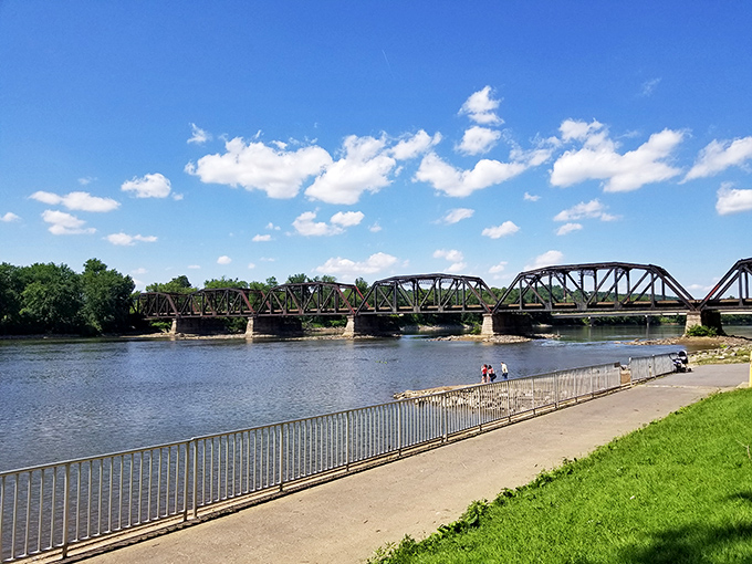 This isn't just any bridge&mdash;it's a steel sentinel that has witnessed decades of river stories while connecting communities on either shore.