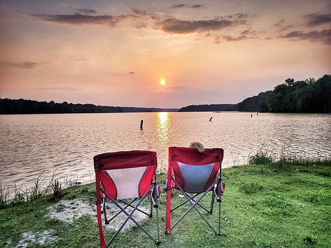 Two empty chairs, one spectacular sunset. Sometimes the best conversations happen in complete silence at Kiser Lake.