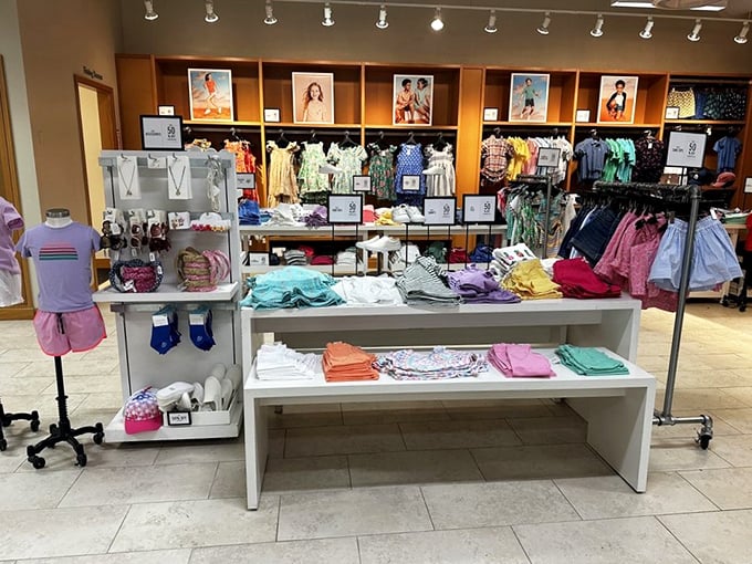 Color-coded childhood joy arranged with military precision. Parents know this rainbow of tiny fashions means scoring adorable outfits without sacrificing next month's mortgage payment.