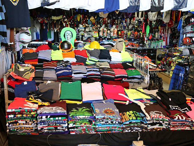 A kaleidoscope of t-shirts creates a textile rainbow that would make any fashionista weak at the knees. Choice paralysis has never been so colorful.