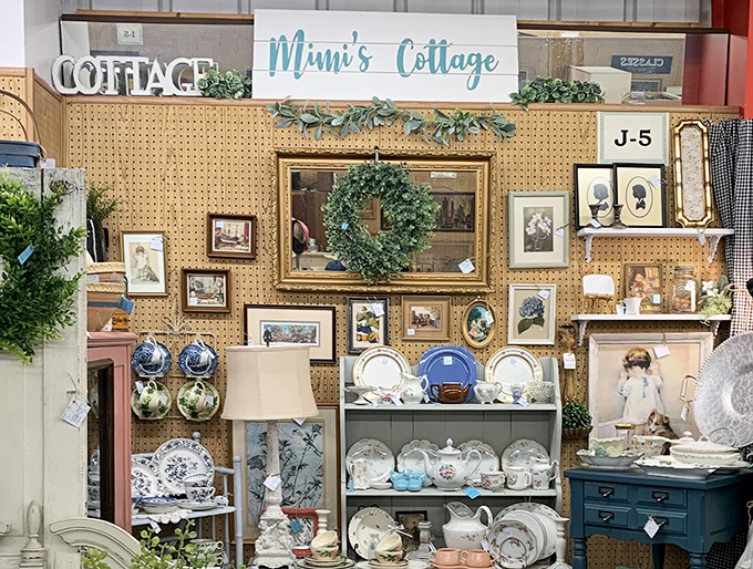 "Mimi's Cottage" isn't just a booth&mdash;it's a perfectly curated slice of grandmotherly heaven, where every teacup and frame seems to whisper, "Take me home."