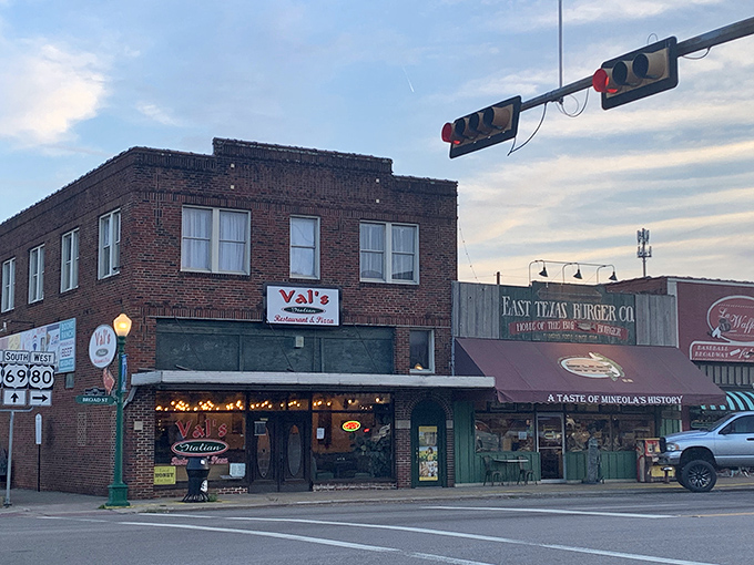 Val's Italian Restaurant and East Texas Burger Company stand as culinary sentinels on Mineola's brick-paved main street, where comfort food reigns supreme.