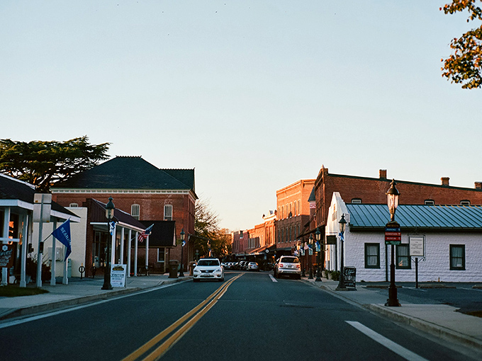 Sunset bathes Berlin's historic downtown in golden light, transforming brick facades into a warm welcome that whispers, "Slow down, you're on small-town time now."
