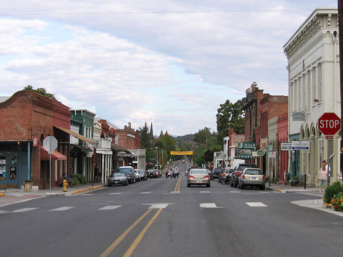 California Street stretches into the distance, its brick buildings standing shoulder to shoulder like old friends who've weathered life's storms together.