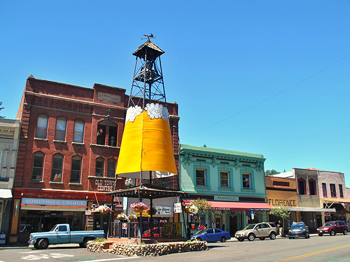 The iconic bell tower stands sentinel over colorful historic buildings, where Gold Rush history meets modern-day treasures in downtown Placerville's walkable heart.