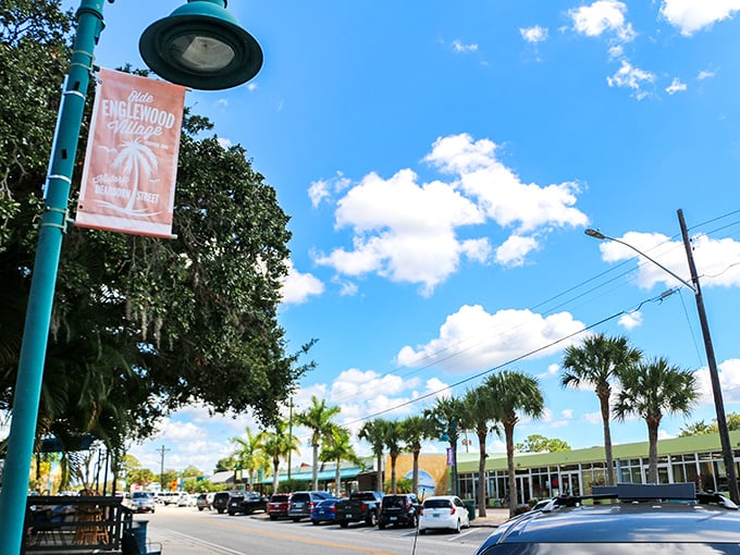 Blue skies and palm trees frame Englewood Village, where "rush hour" means three people deciding who gets the last key lime pie at the bakery.
