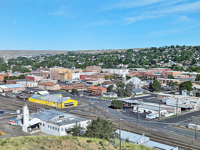 From this bird's-eye view, Pendleton reveals itself as a patchwork of brick buildings, tree-lined neighborhoods, and rolling hills—small-town America at its finest.