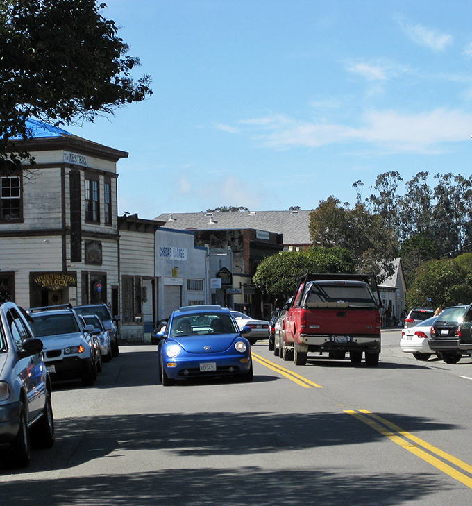 A blue Volkswagen Beetle perfectly at home on this throwback street. In Point Reyes Station, even the parking feels like a step back to simpler times.