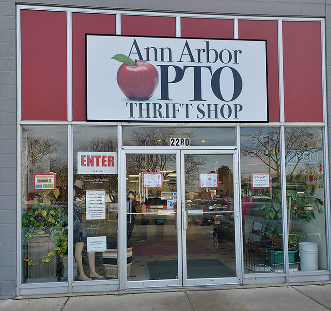 Two orange traffic cones stand guard at the entrance, the thrift shop's version of velvet ropes at an exclusive club anyone can join.
