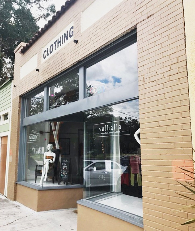 That vibrant red door isn't just an entrance—it's a portal to a parallel universe where yesterday's fashion becomes tomorrow's statement pieces.