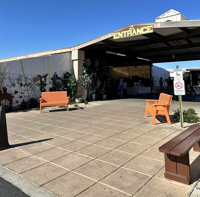 The entrance beckons with its cheerful orange benches &ndash; nature's way of saying "rest here after you've shopped yourself silly."