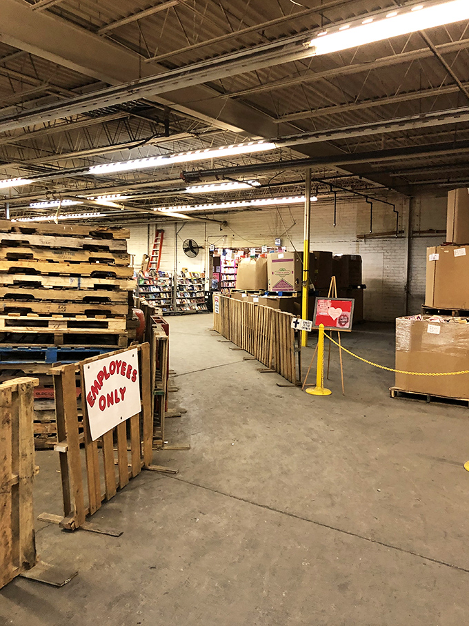 Industrial chic meets bibliophile heaven in this warehouse space. Those wooden pallets aren't just for show&mdash;they're the staging area for literary treasures waiting to be shelved.