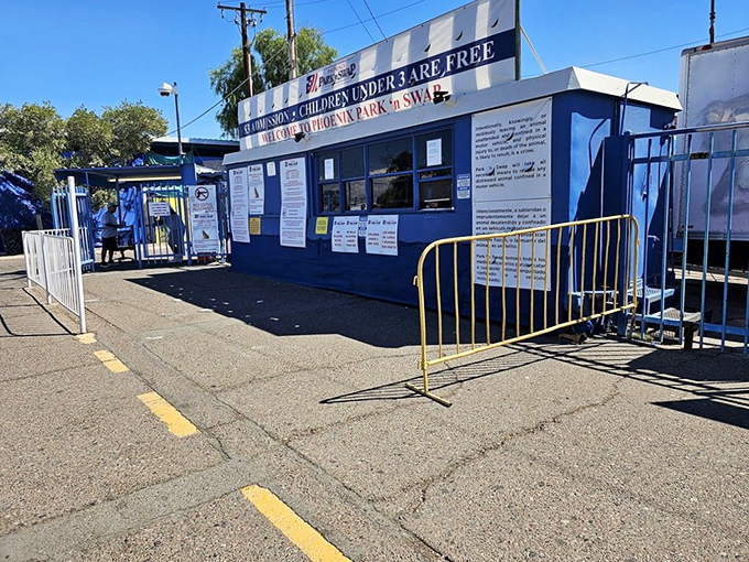 The blue entrance booth&mdash;gateway to bargain paradise. Like a carnival ticket booth, but instead of rides, you're buying access to thousands of possibilities.