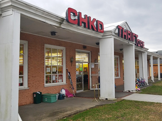 Bold red letters announce your arrival at bargain paradise. The columns aren't holding up ancient history—just decades of delightful secondhand discoveries.