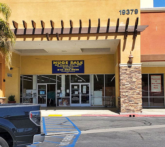 Colorful banners announce sales beneath wooden pergolas, nature's way of saying "these discounts are too hot to handle!"
