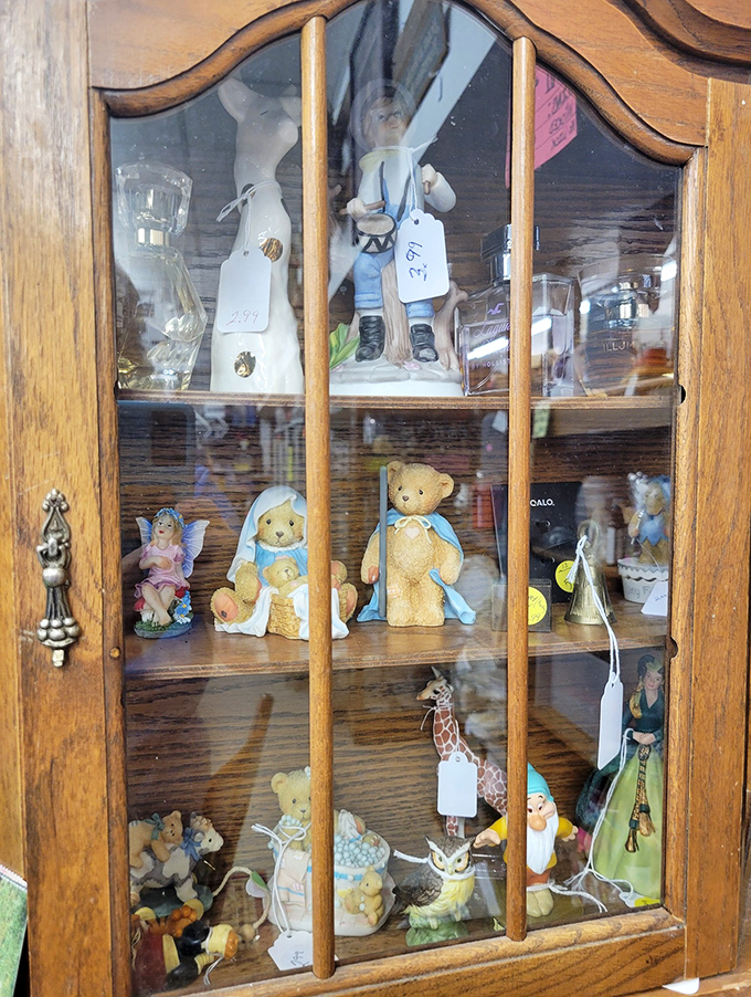 Tiny guardians of nostalgia stand watch behind glass. These collectible figurines aren't just knick-knacks&mdash;they're memories waiting to be adopted into new homes.