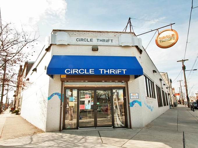 That iconic blue awning serves as a beacon for bargain hunters, like a lighthouse guiding ships to the shores of secondhand paradise.