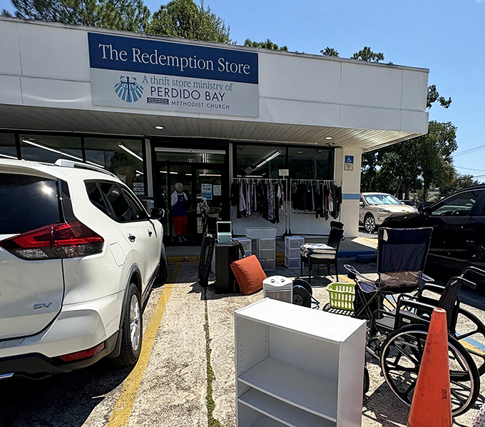Outdoor furniture tempts passersby while the store's ministry connection reminds shoppers their bargain hunting supports community programs.