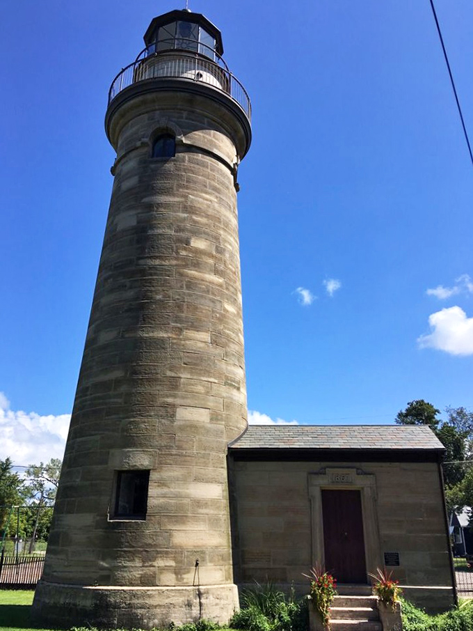 Looking up at this 49-foot tower feels like staring at architectural poetry. Those sandstone blocks have witnessed more history than your grandmother's photo albums.