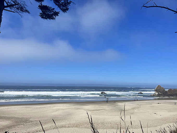 Those towering headlands embrace this golden cove like protective arms welcoming weary coastal wanderers home.