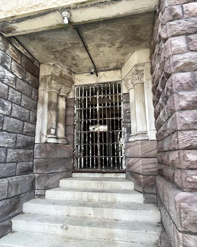 Cold steel and eerie silence define this corridor where metal-plated walls once prevented desperate inmates from tunneling to freedom. Walking through feels like stepping into a different century.