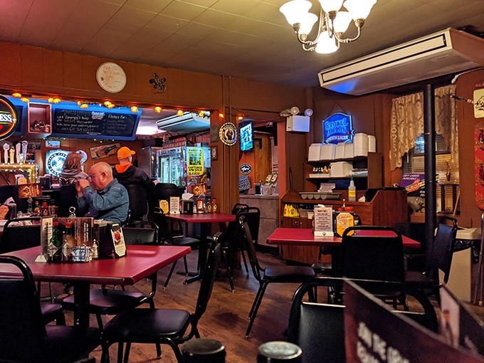 Wood paneling, neon signs, and red-topped tables create that perfect "loosen your belt" atmosphere. This isn't a place for pretension&mdash;it's a temple of honest-to-goodness flavor.